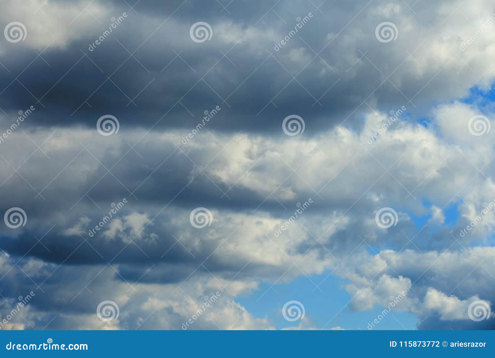 Background of Gray Dramatic Clouds in a Blue Sky. Stock Photo - Image ...