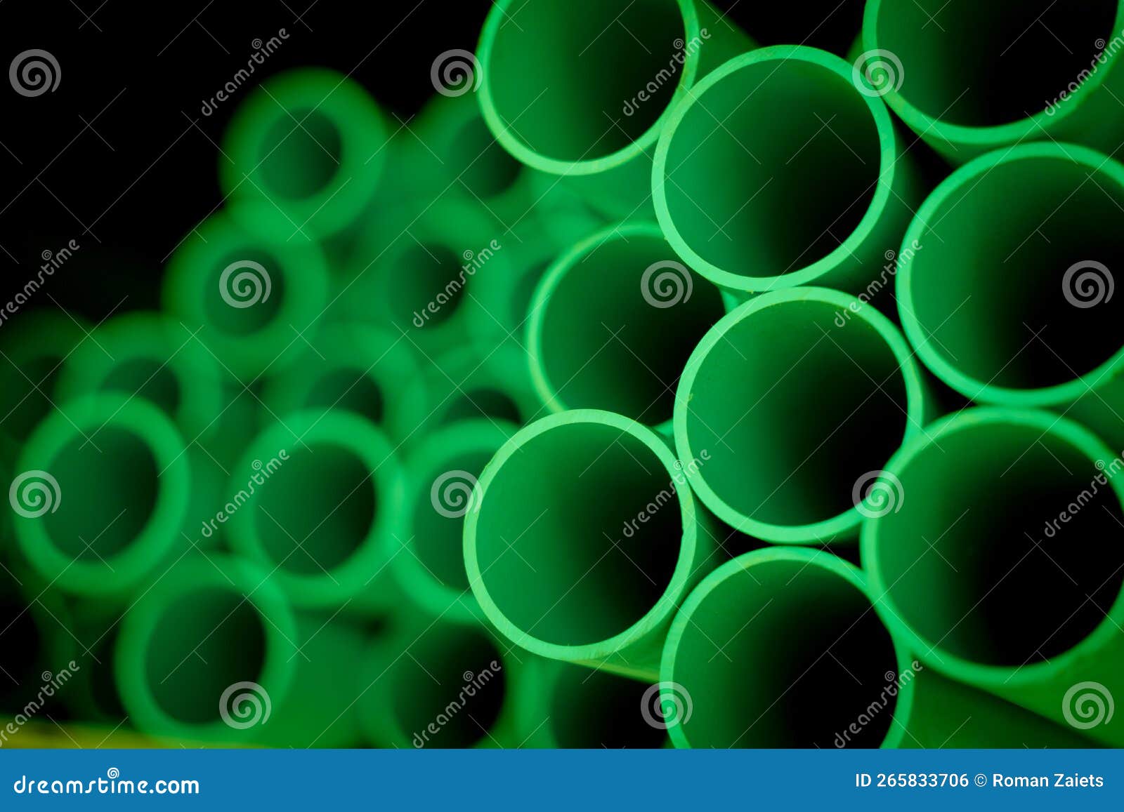 Background of the Green Plastic Pipes in Stacked Stock Photo - Image of ...