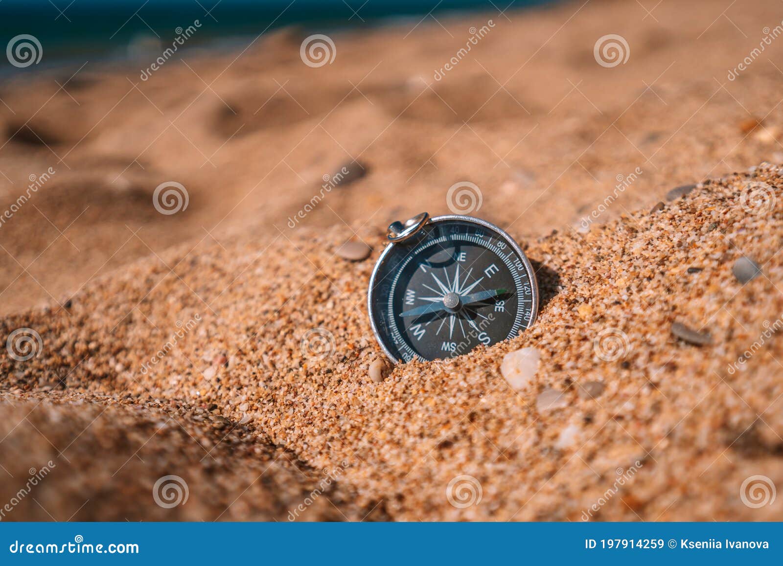 Background Image of Compass Lying on Beach with Sea View, Travel ...