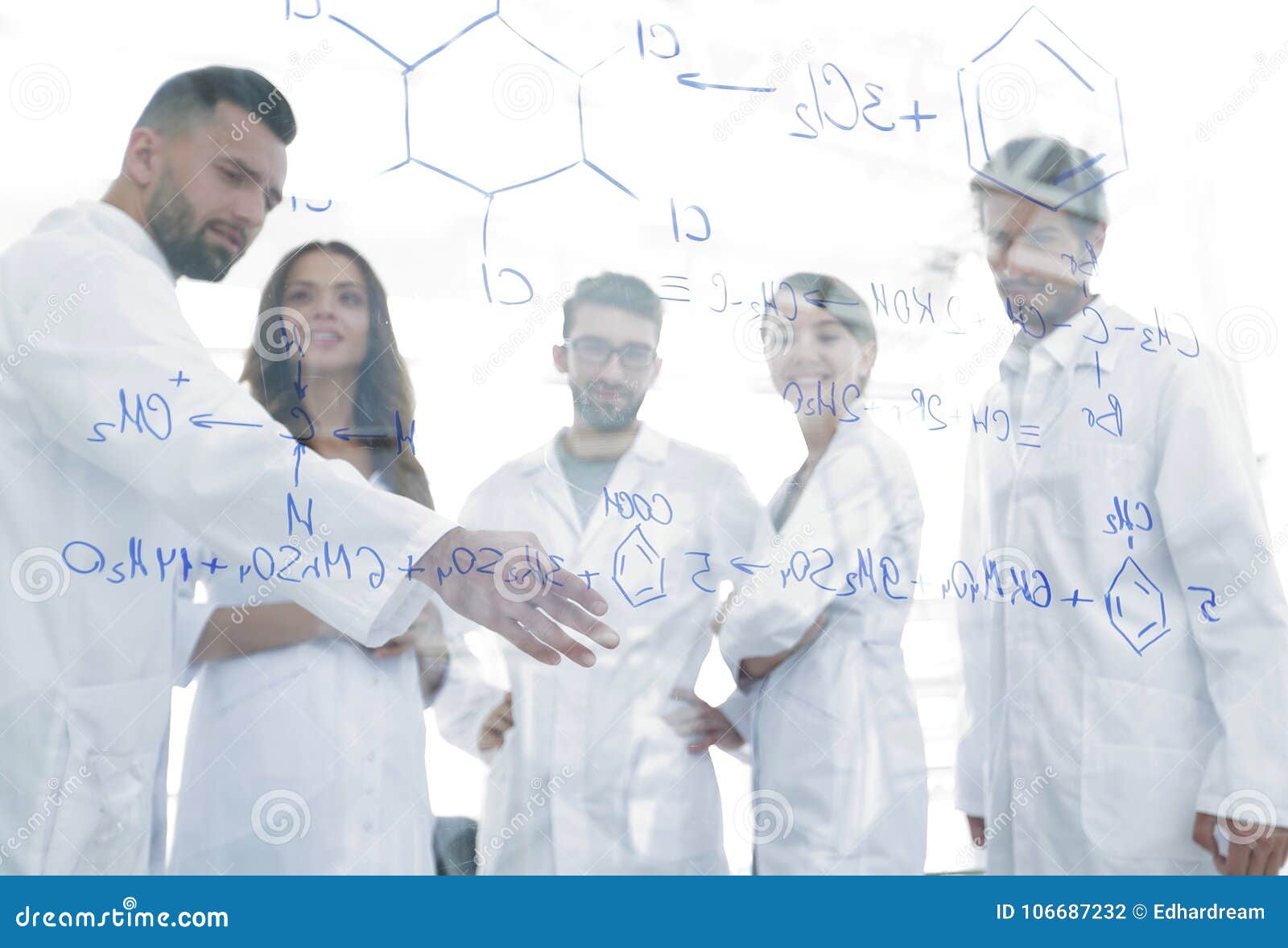 In the Background Image Group Laboratory Scientists Discussing Their ...