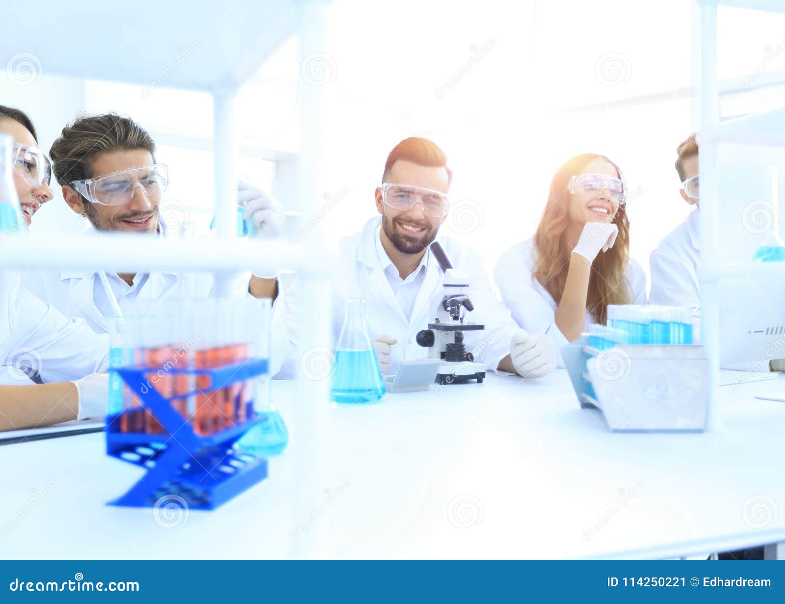Background Image is a Group of Scientists Microbiologists. Stock Image ...