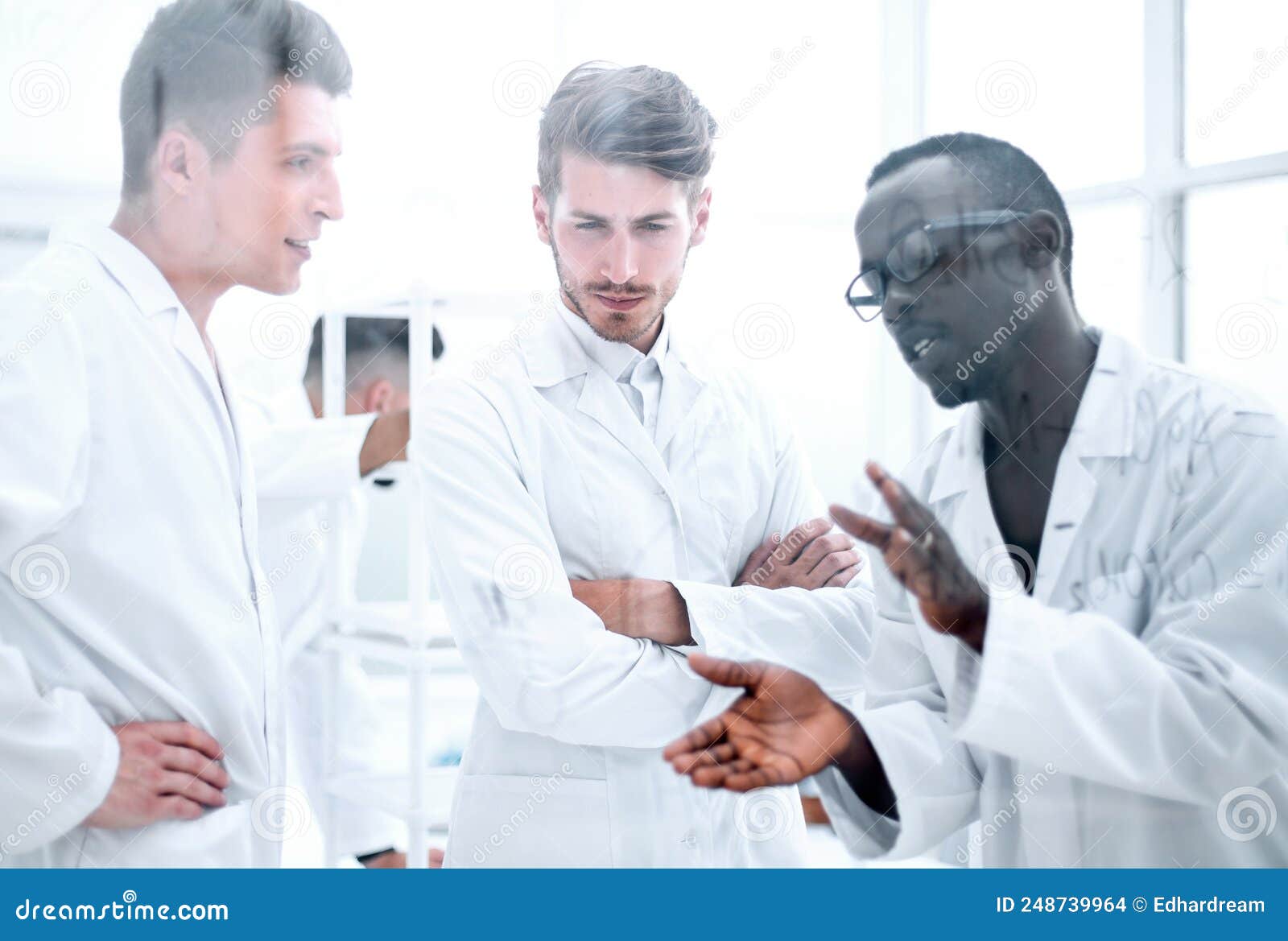 Background Image is a Group of Scientists Microbiologists. Stock Photo ...