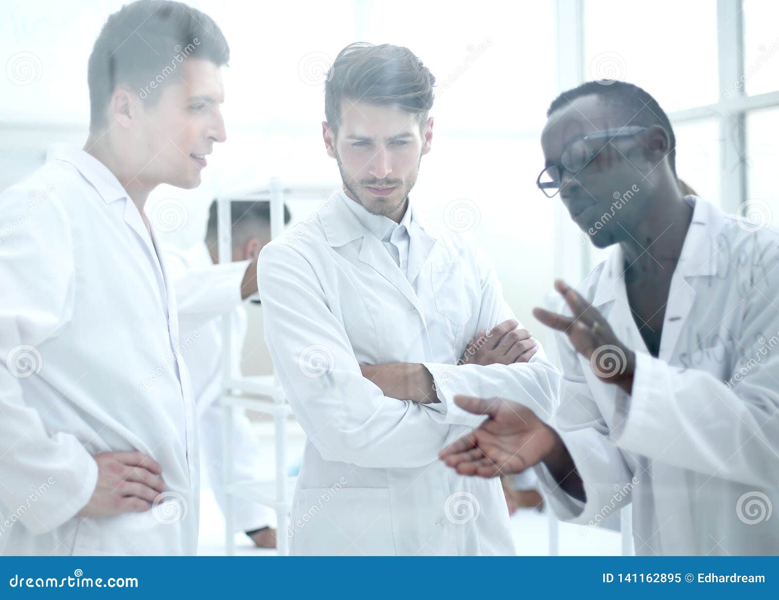 Background Image is a Group of Scientists Microbiologists. Stock Image ...