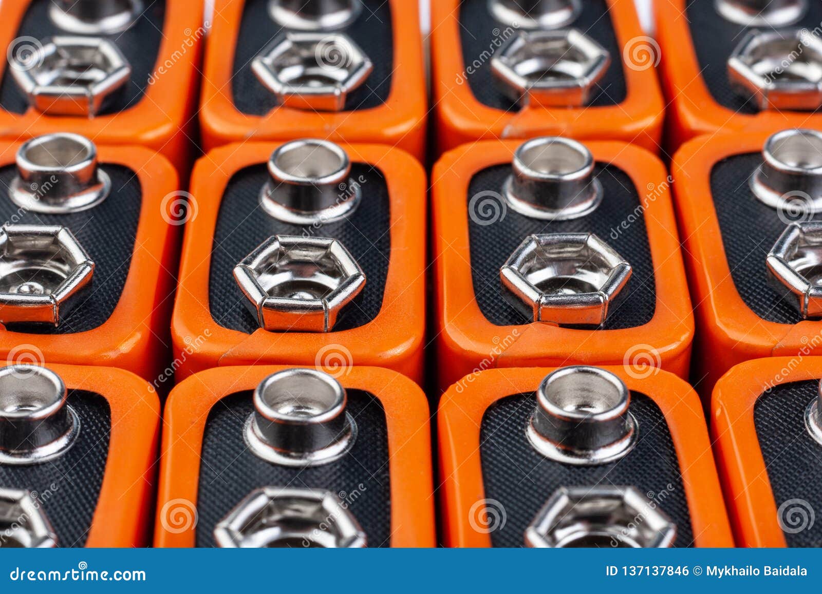 Background Image of a Large Number of Orange Batteries, Standing in ...