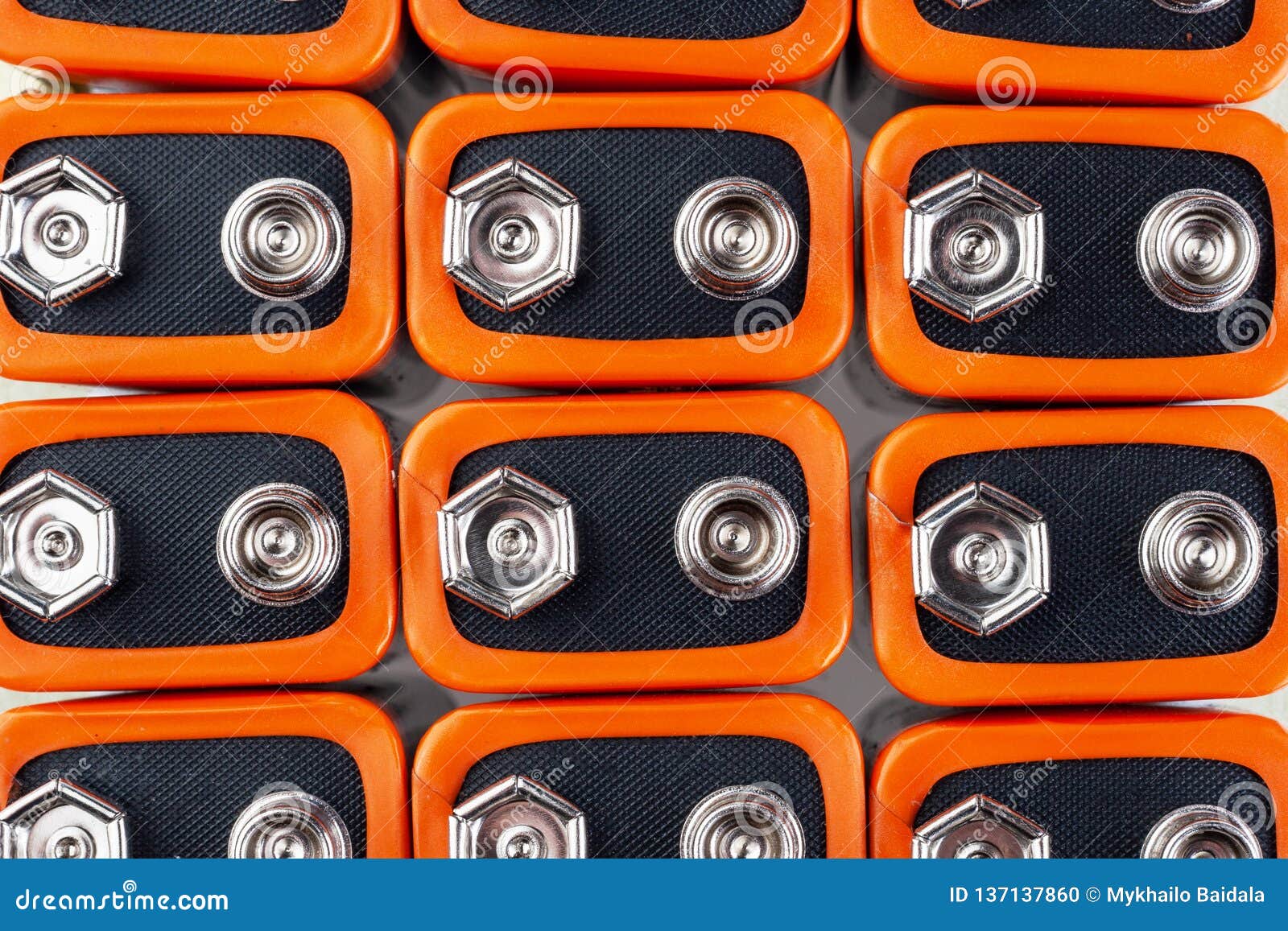 Background Image of a Large Number of Orange Batteries, Standing in ...