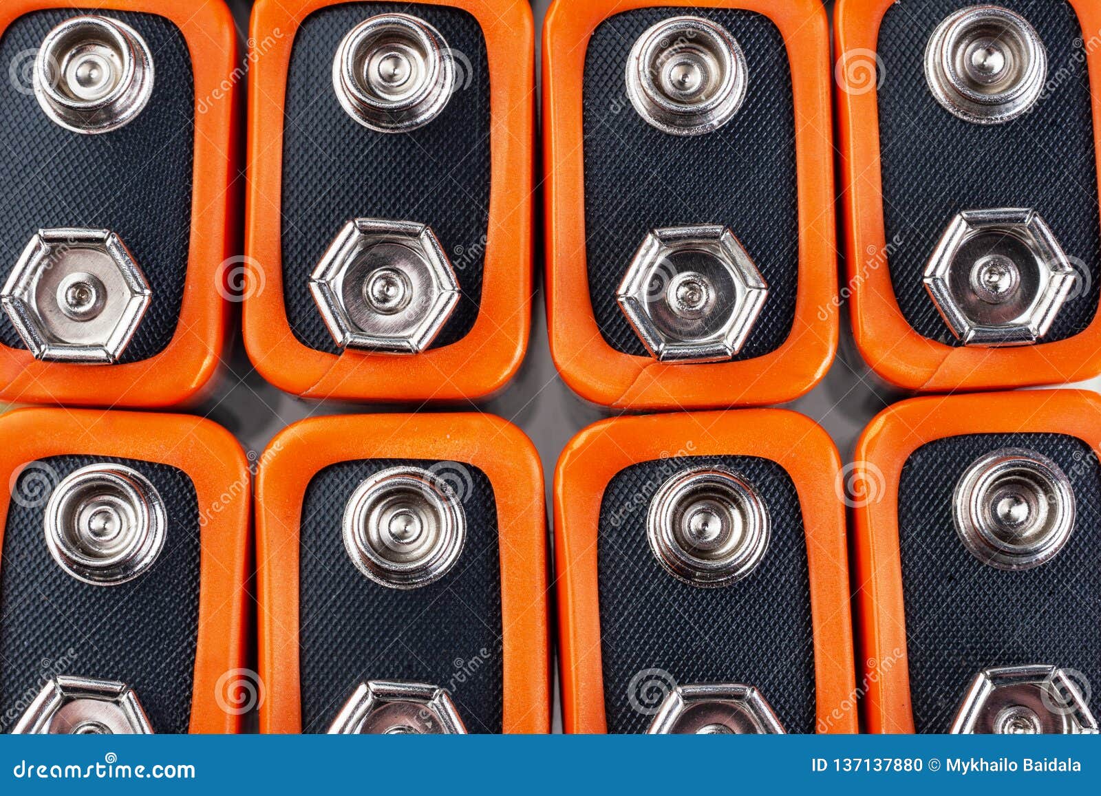 Background Image of a Large Number of Orange Batteries, Standing in ...