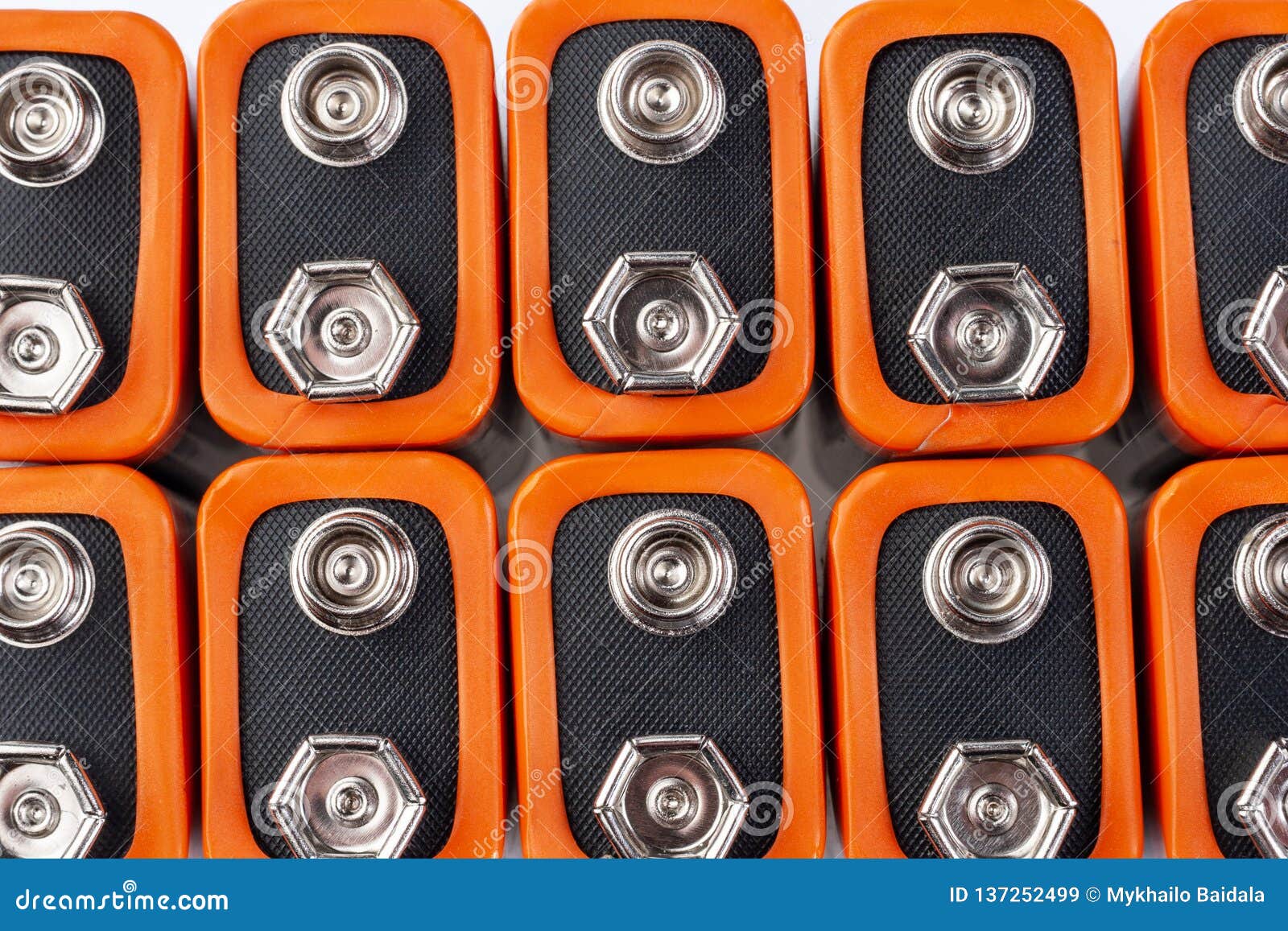Background Image of a Large Number of Orange Batteries, Standing in ...