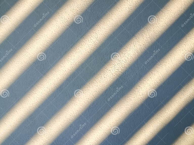 The Background Image of Light and Shadow Reflecting on the Wall Creates ...