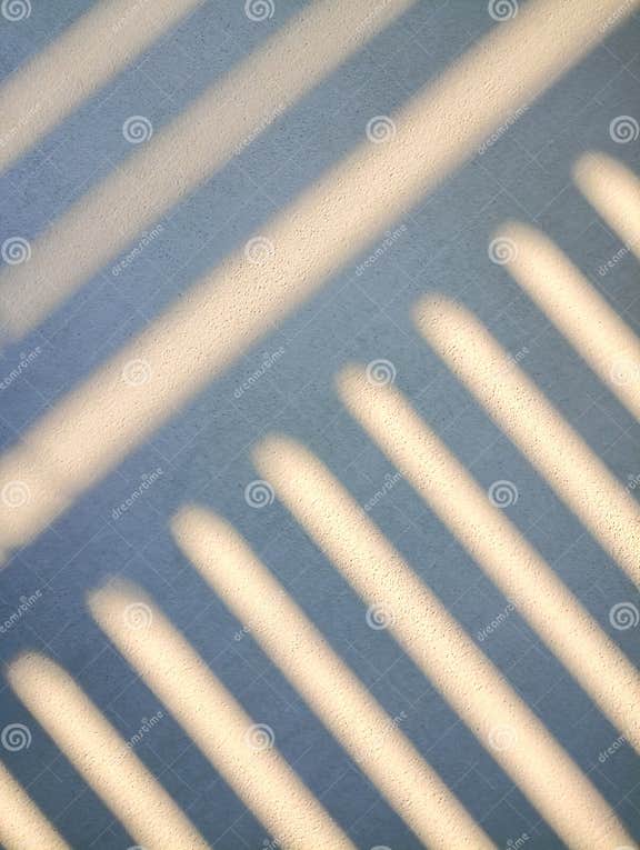 The Background Image of Light and Shadow Reflecting on the Wall Creates ...