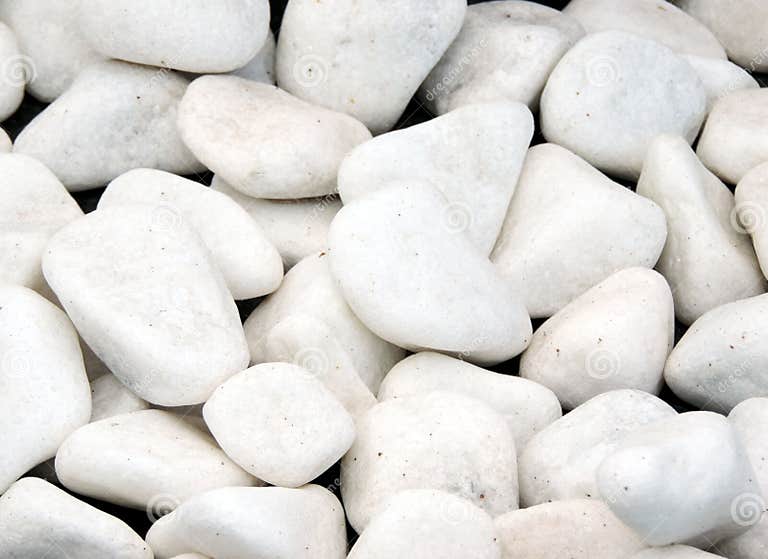 Rounded white stones stock image. Image of stone, close - 210257319