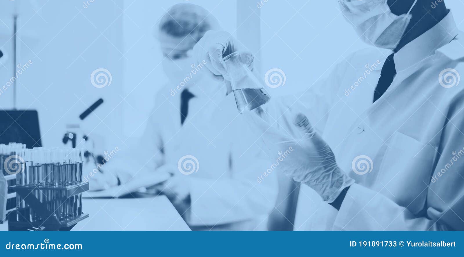 Background Image Scientists are Conducting Research in the Laboratory ...