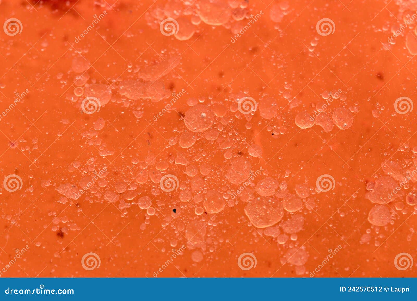 Background Image of Some Bubbles in an Orange Substance Stock Photo ...
