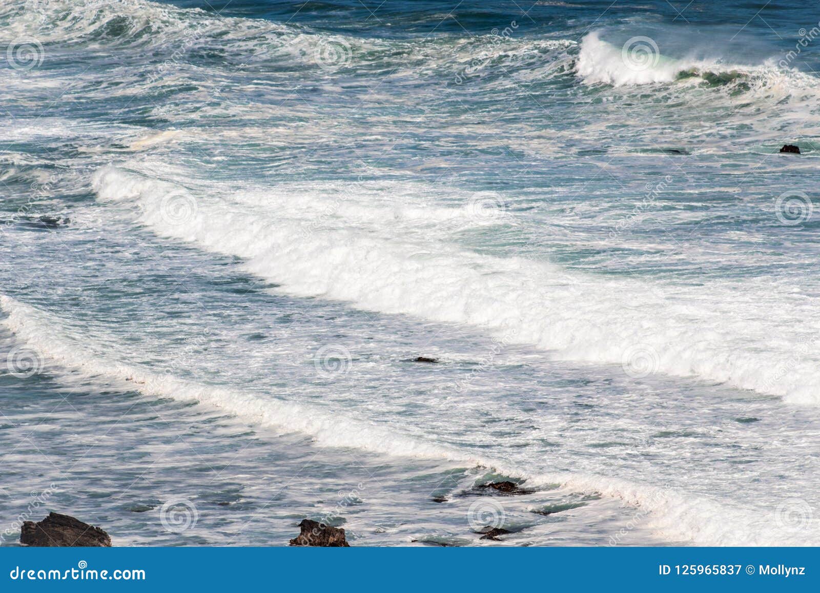 Rolling Ocean Waves stock image. Image of water, surf - 125965837