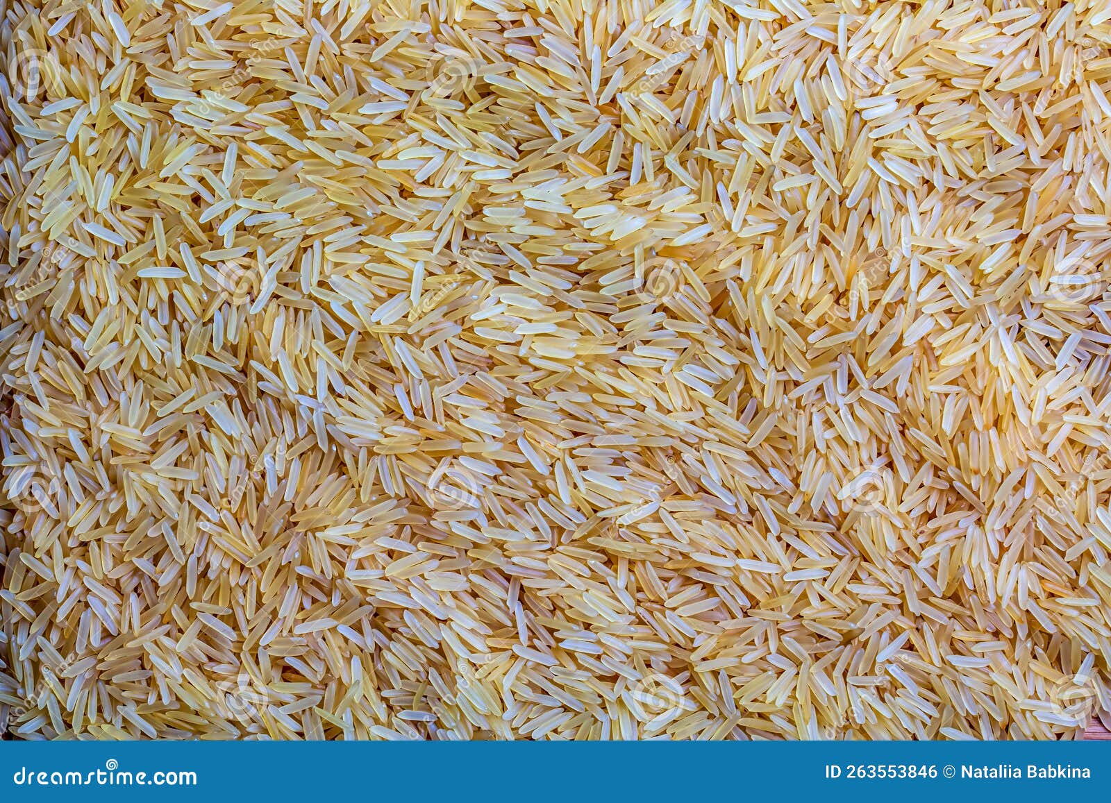 Background Of Long Grain Parboiled Uncooked Rice. Rice Groats As Background And Texture Stock ...