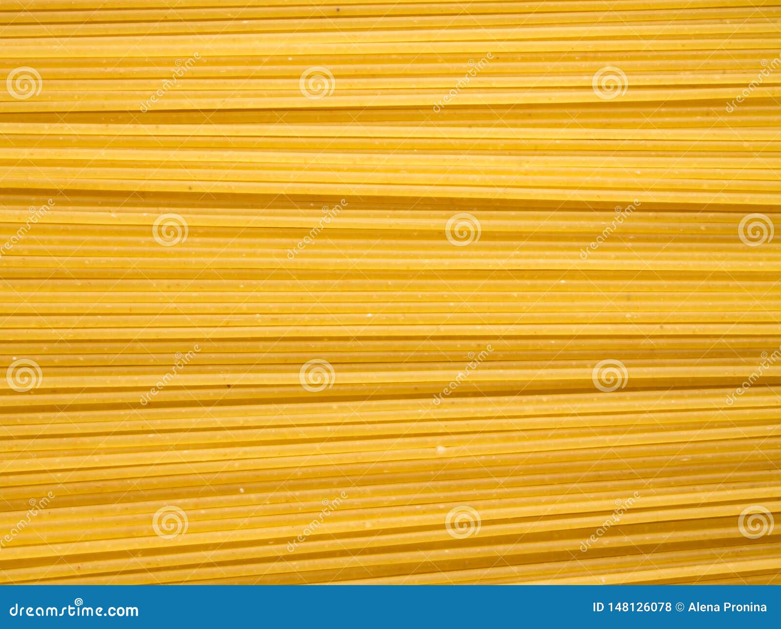 Background of Long Raw Yellow Spaghetti Pasta in Horizontal Plane Stock ...