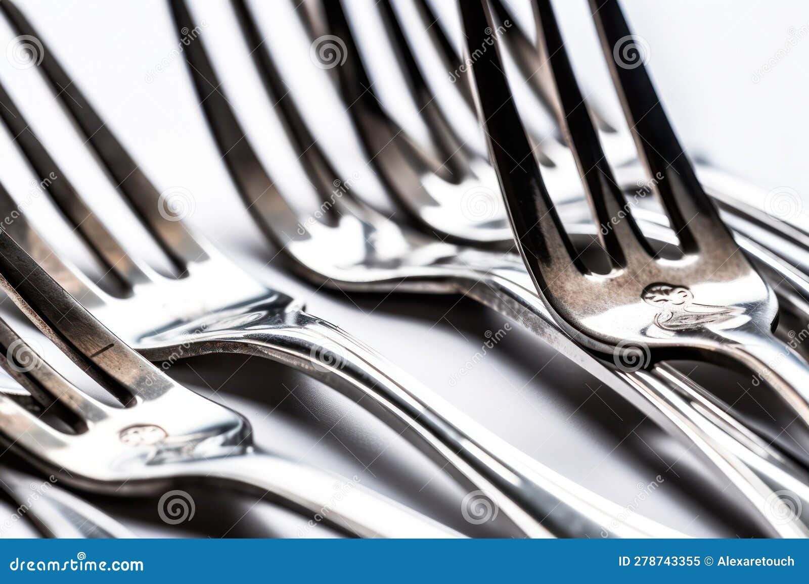 Background with a Lot of Metal Forks on a Light Background Stock ...