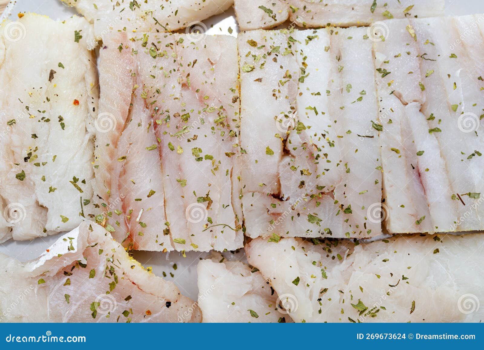 Background Made of Cod Fish Fillet Cut into Squares and Sprinkled with ...