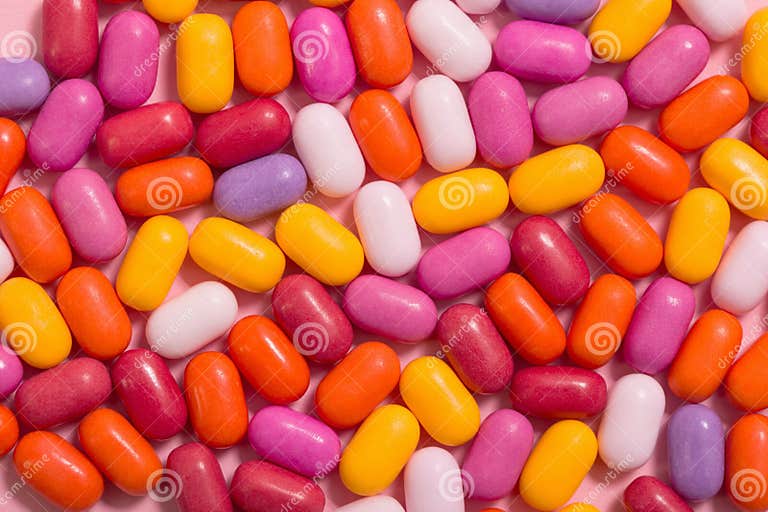 The Background of Multi-colored Small Sweets Stock Image - Image of ...