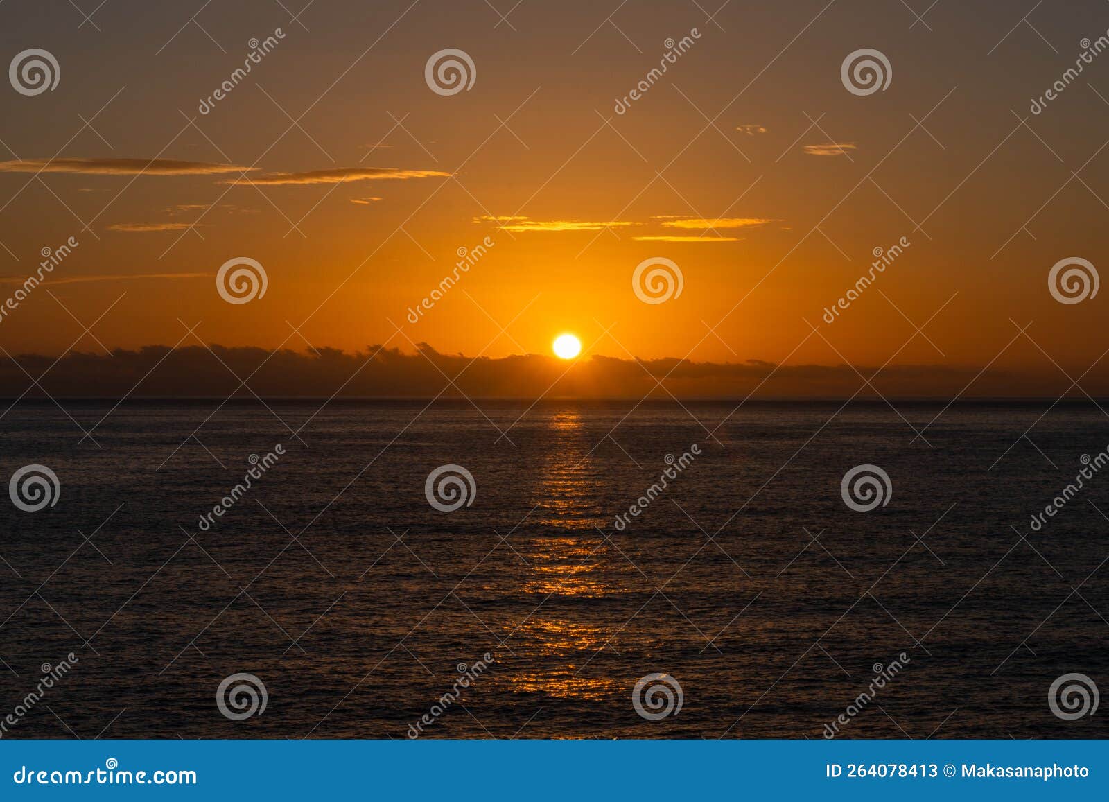 Background of Ocean Landscape with a Golden Sun Over a Calm Ocean Stock ...