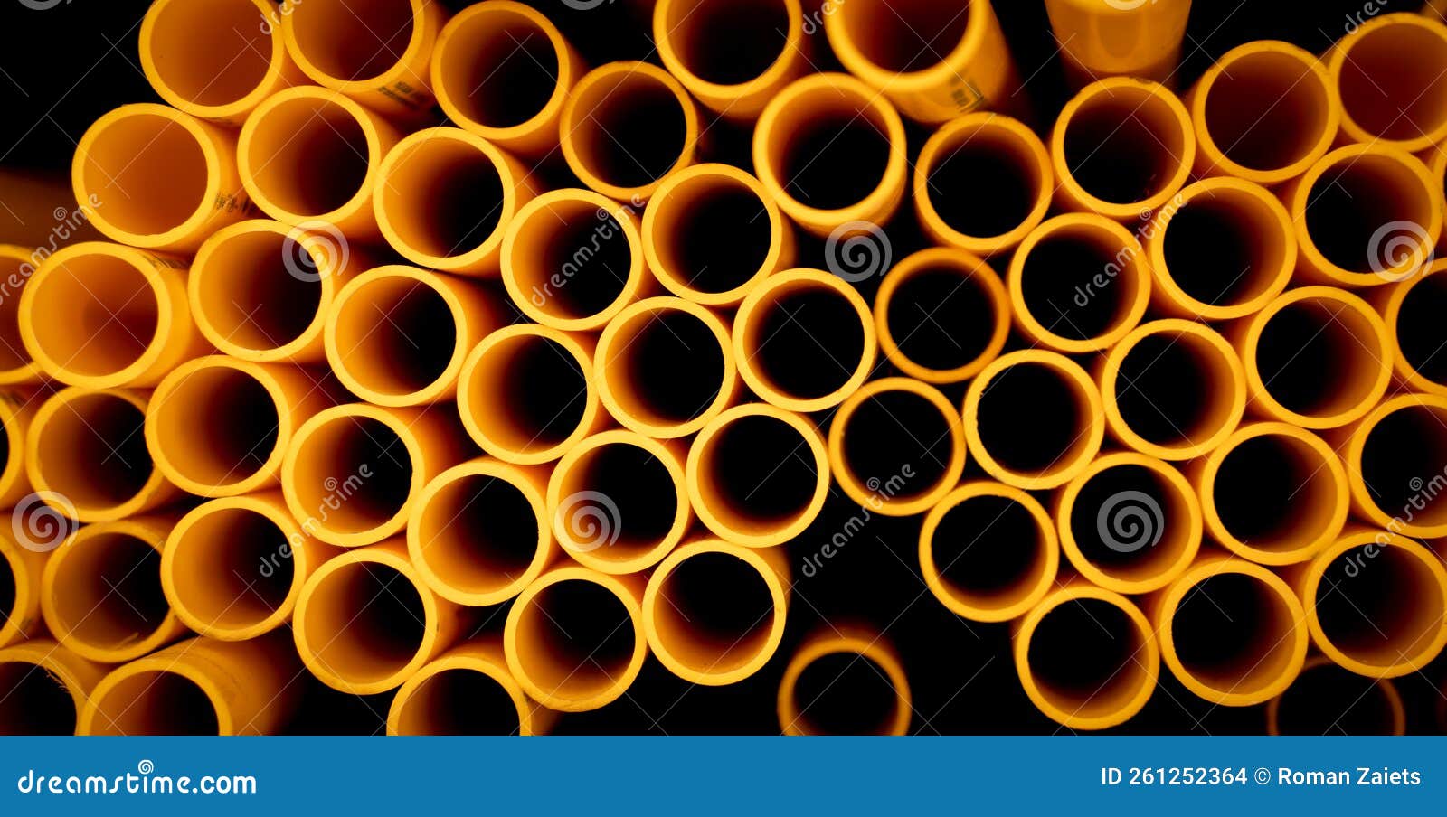Background of the Orange Plastic Pipes in Stacked Stock Photo - Image ...