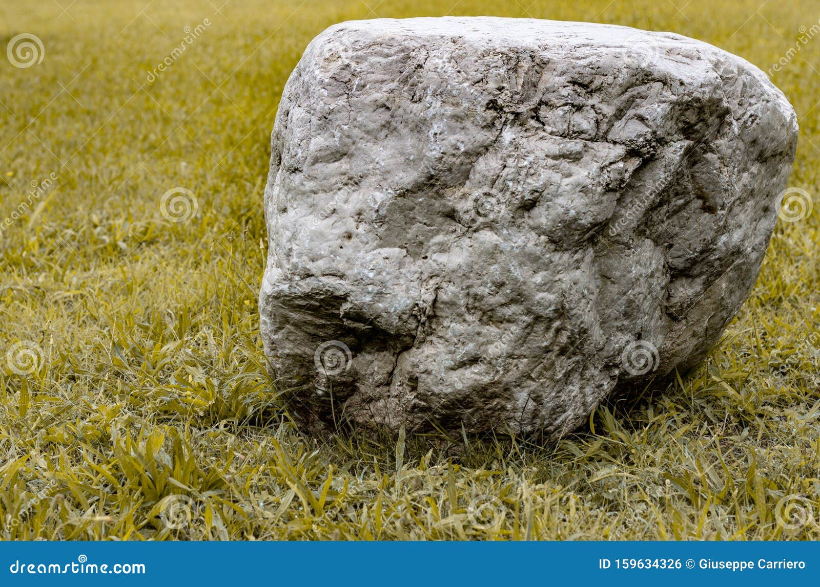 Background. Photograph of an Autumn Meadow with a Large Boulder on it ...