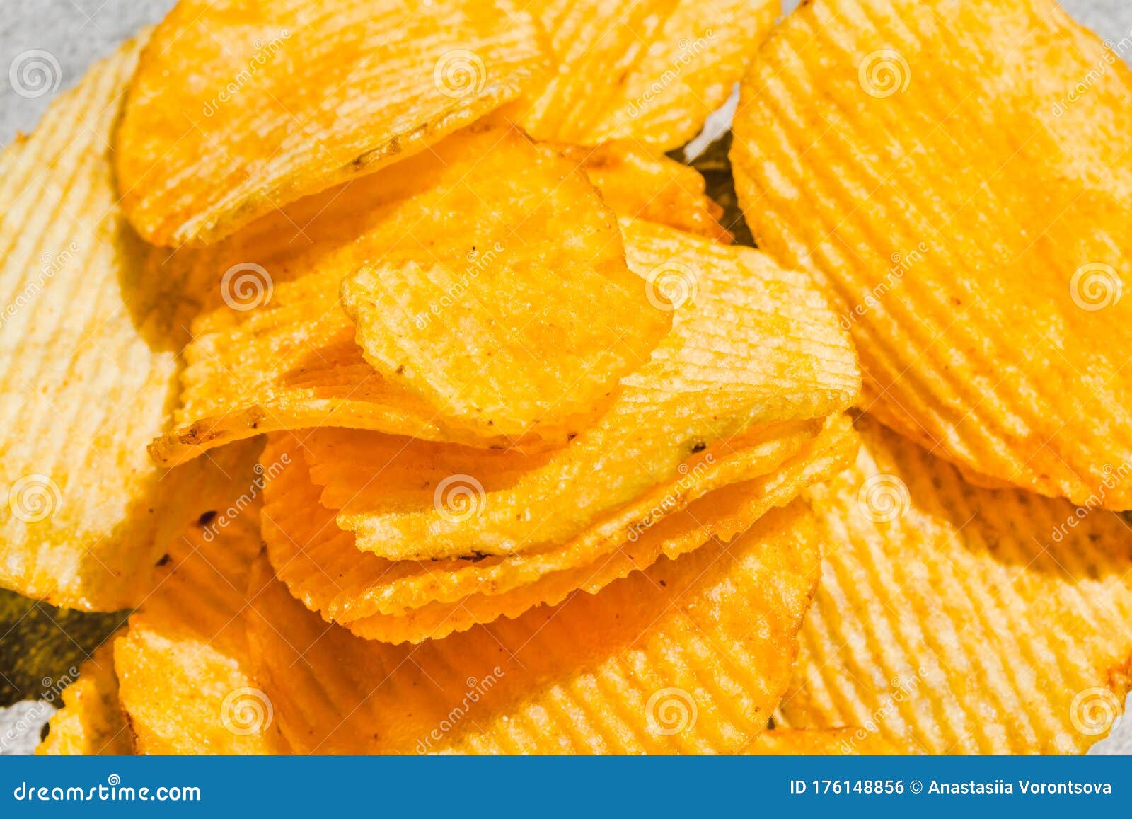 Background of Potato Crisps Close-up. the Texture of the Corrugated ...