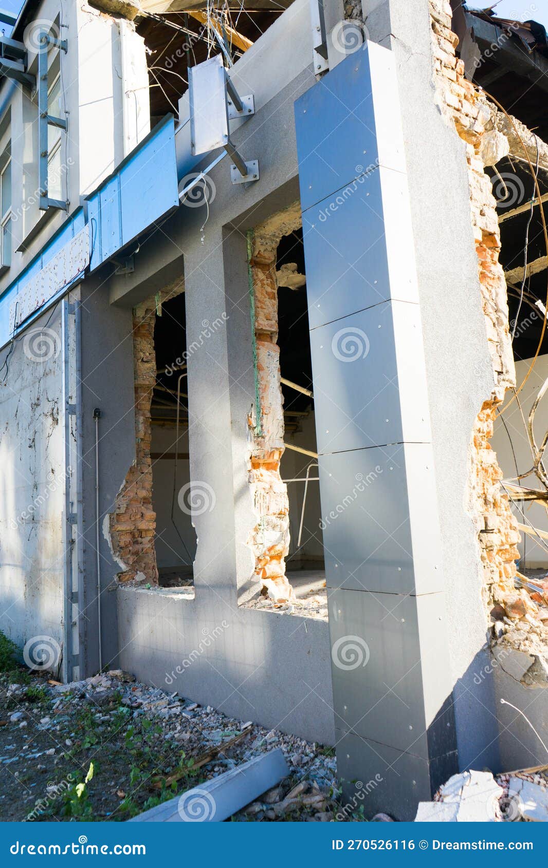 Background of Process of Demolition of Building. Excavator Breaking Old ...