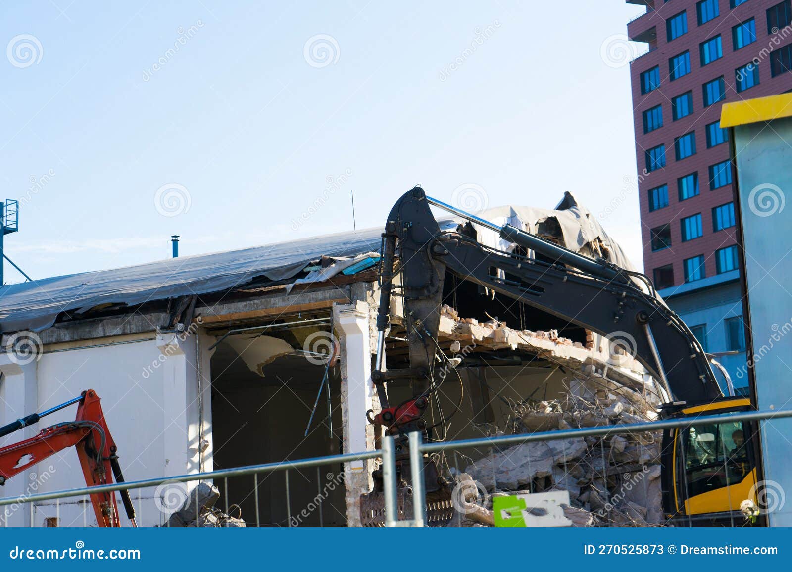 Background Of Process Of Demolition Of Building. Excavator Breaking Old ...