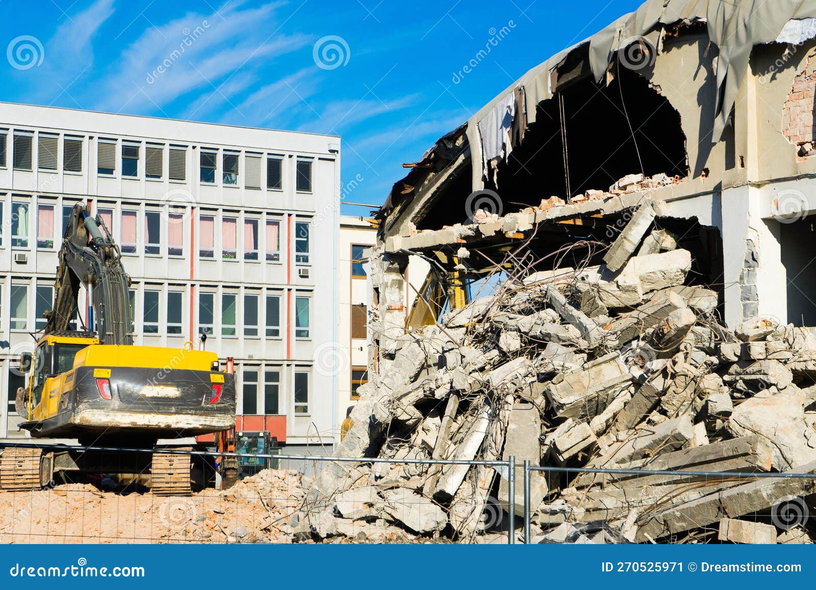 Background of Process of Demolition of Building. Excavator Breaking Old ...