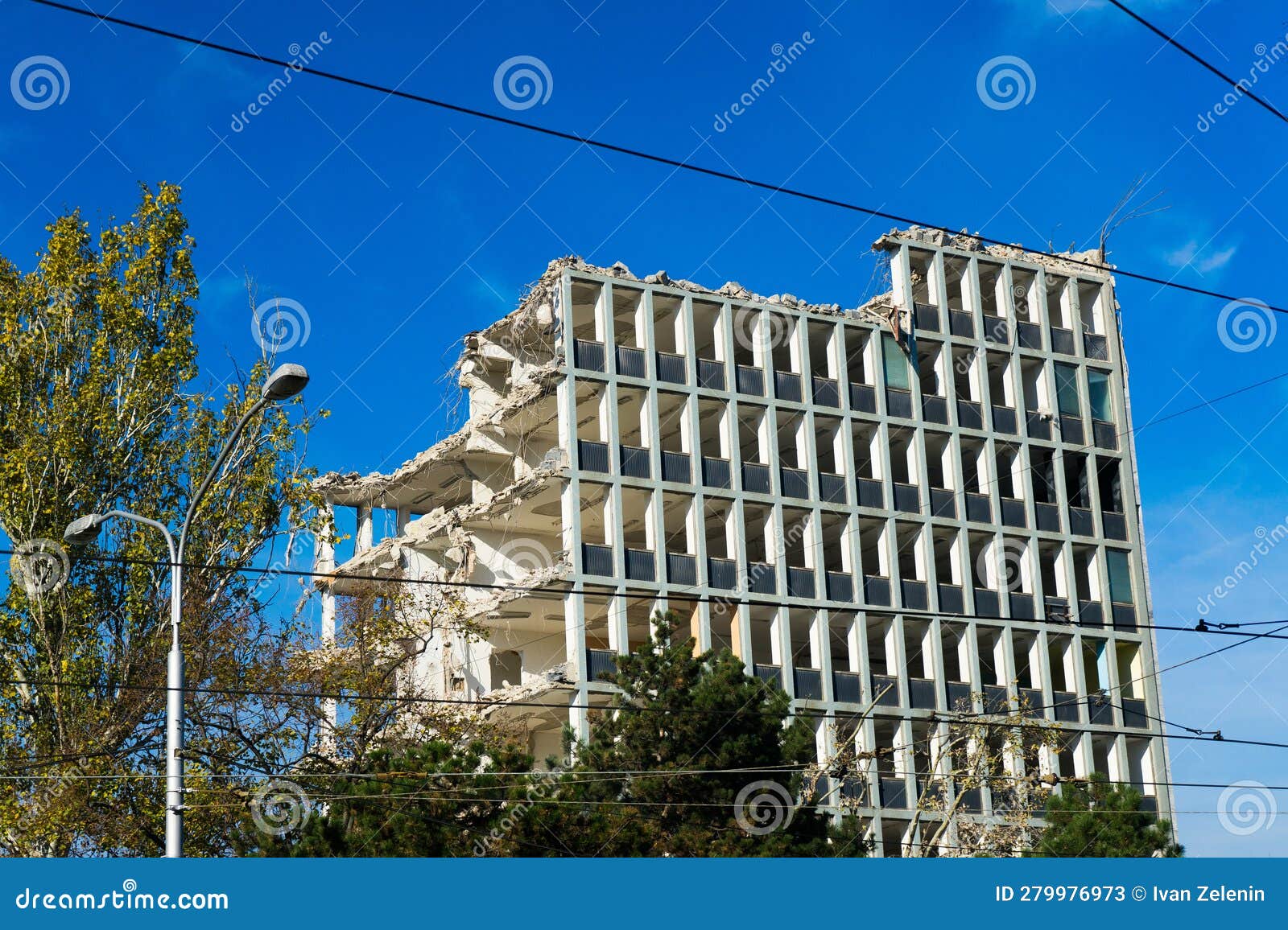 Background of Process of Demolition of Building. Excavator Breaking Old ...