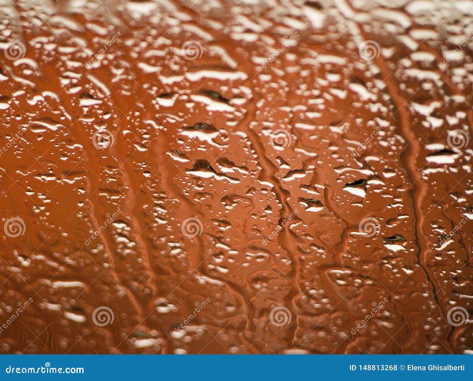 Wallpaper orange raindrops stock photo. Image of glass - 148813268