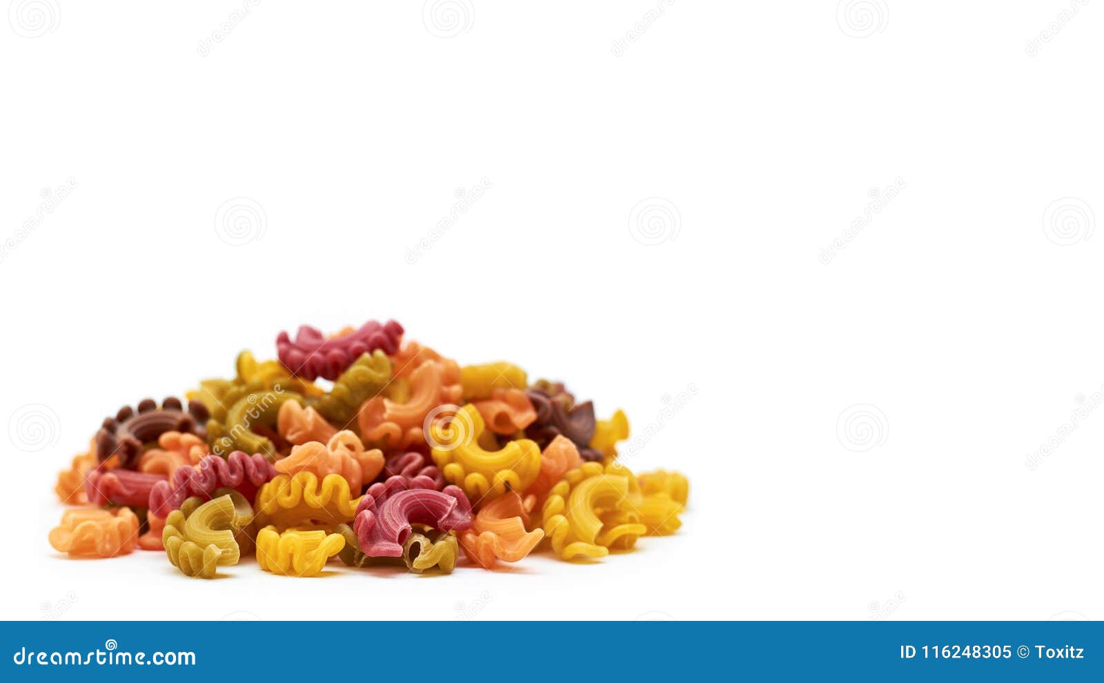 Background of Raw Colored Macaroni. Isolated on White Background Stock ...