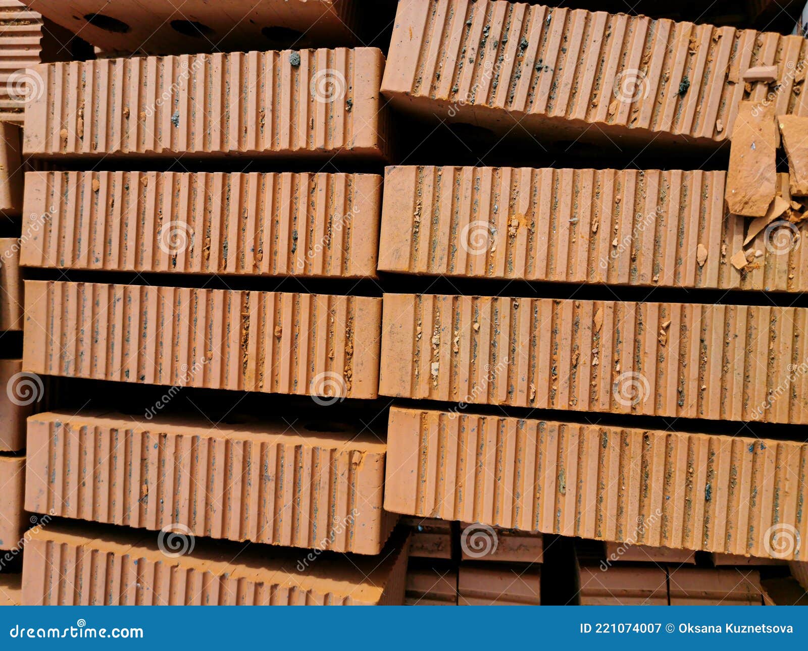 Background from Red Fresh Bricks at a Construction Warehouse. Stock ...