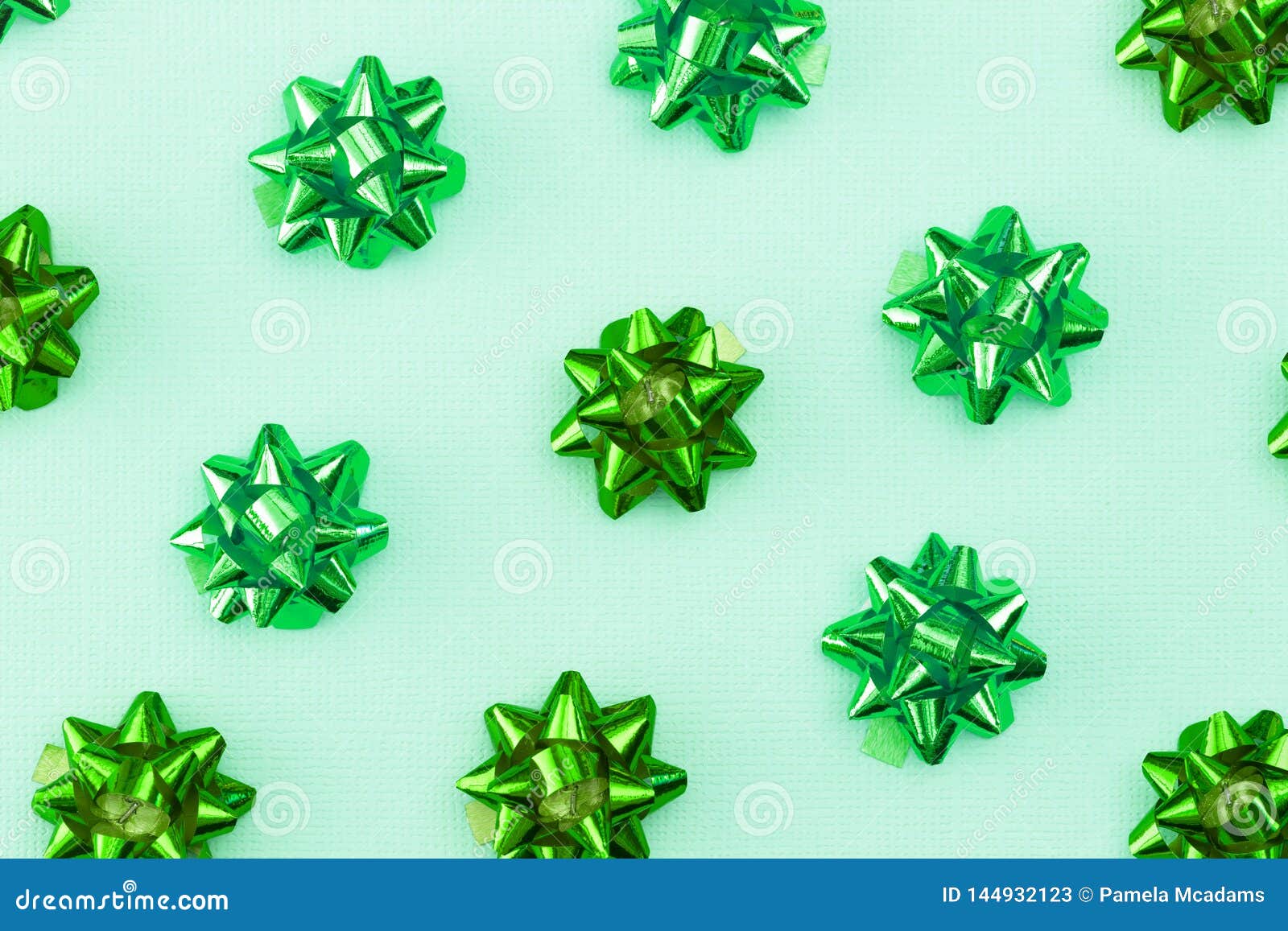 Background with Repeating Pattern of Bows and Ribbons Stock Image ...