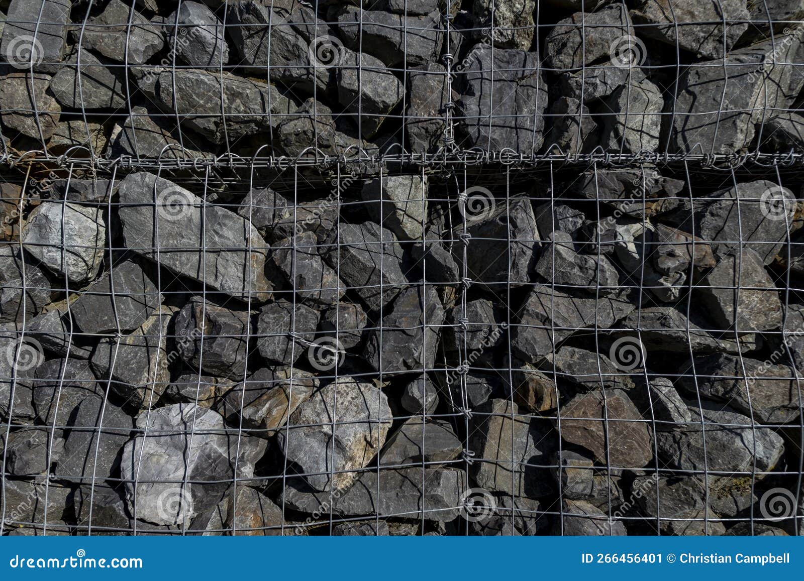 Background-rocks Supported by Wire Stock Image - Image of color, stones ...