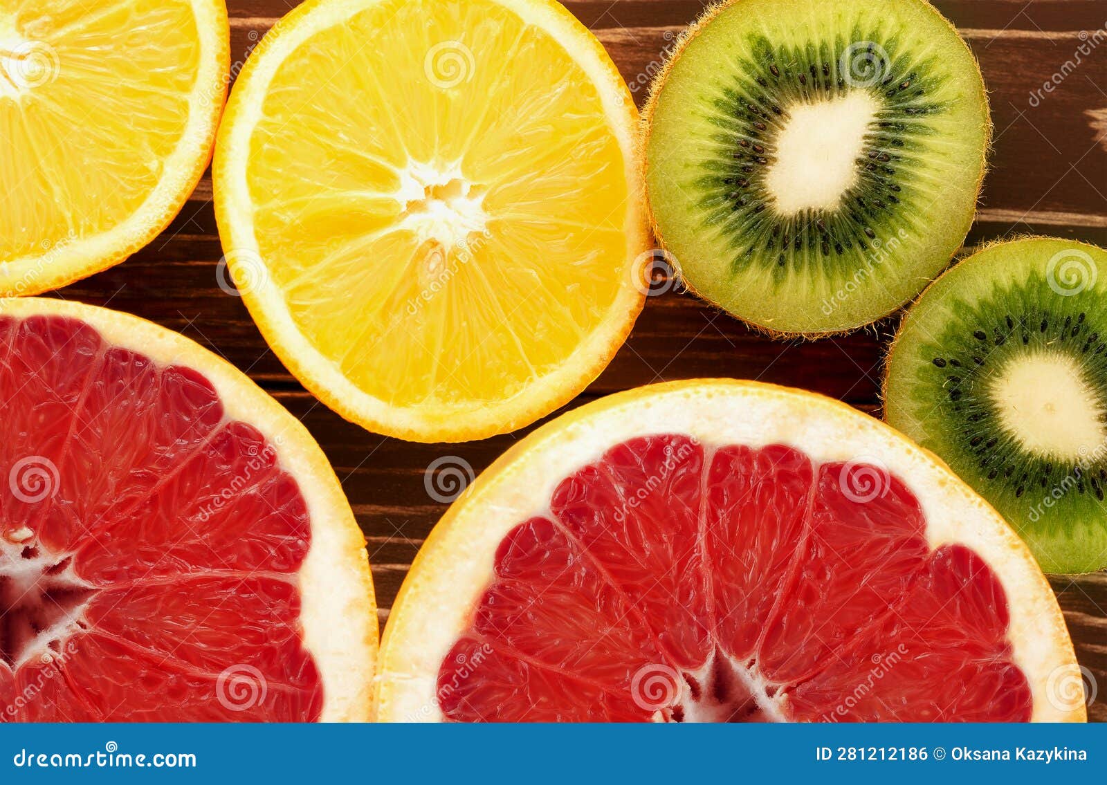 Background of Round Citrus Fruits, Orange, Grapefruit and Kiwi Stock Photo - Image of tropical ...