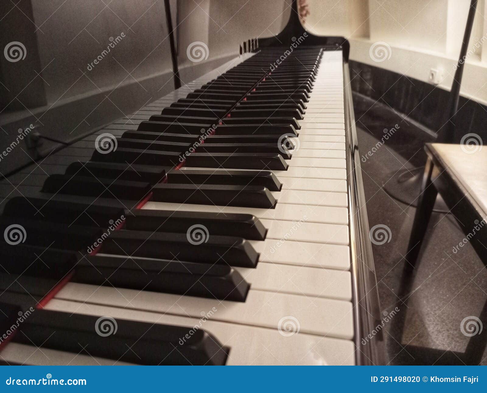 The Background is a Row of Beautiful and Symmetrical Classical Piano ...