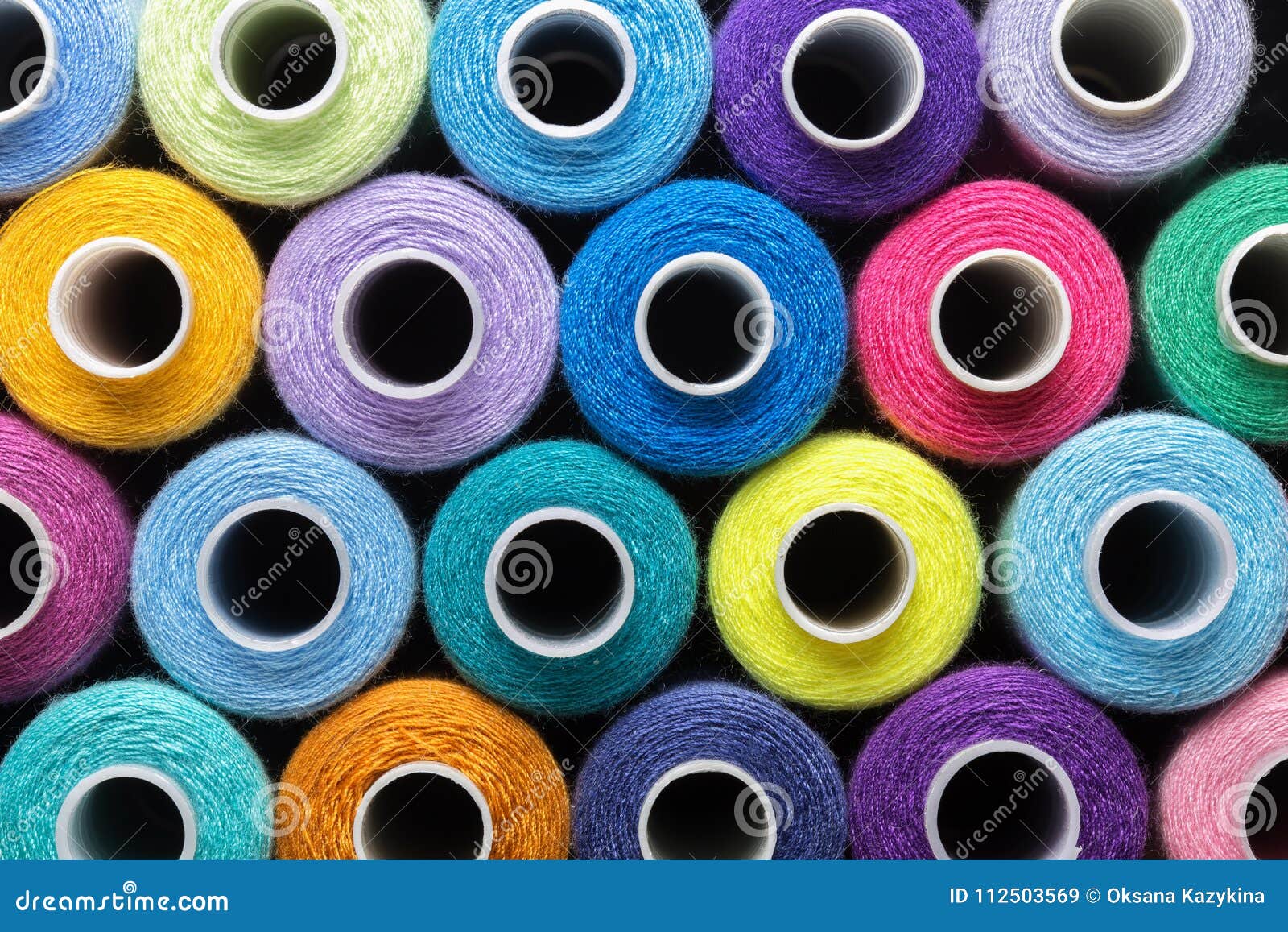 Background of Sewing Threads in Different Colors Pink, Blue, Green and ...
