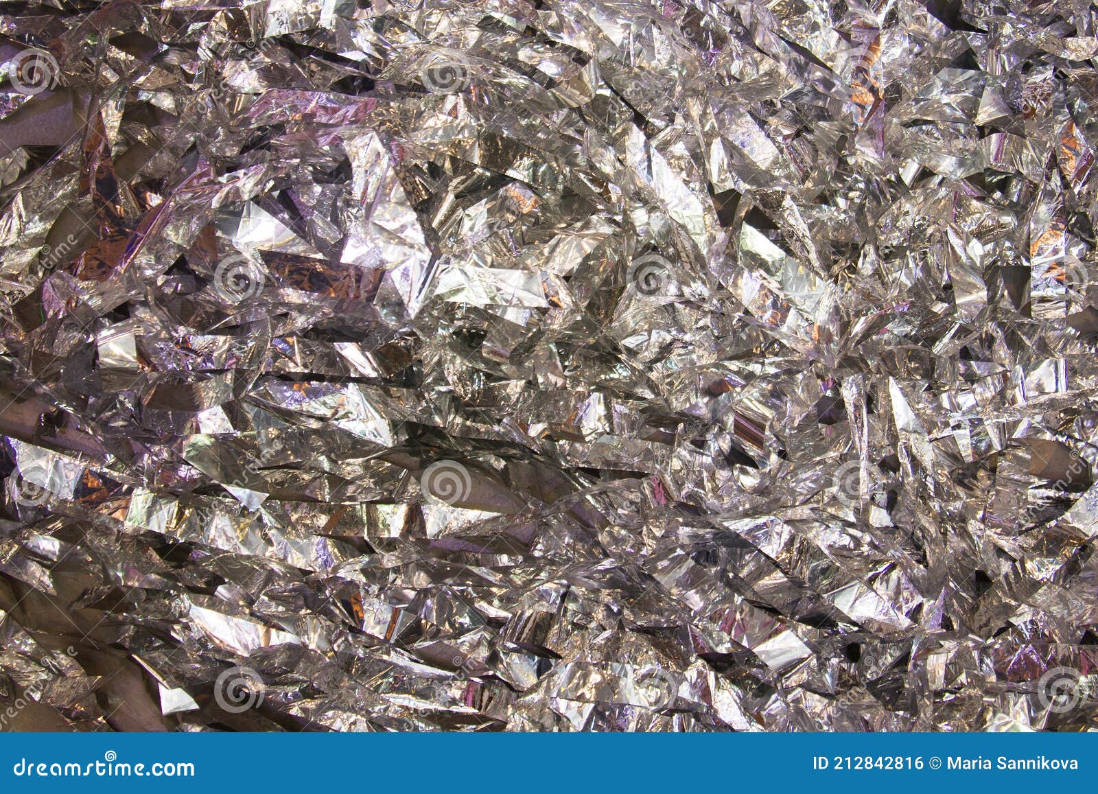 A Background of Shiny Silver Foil Strips Sparkling in the Light ...