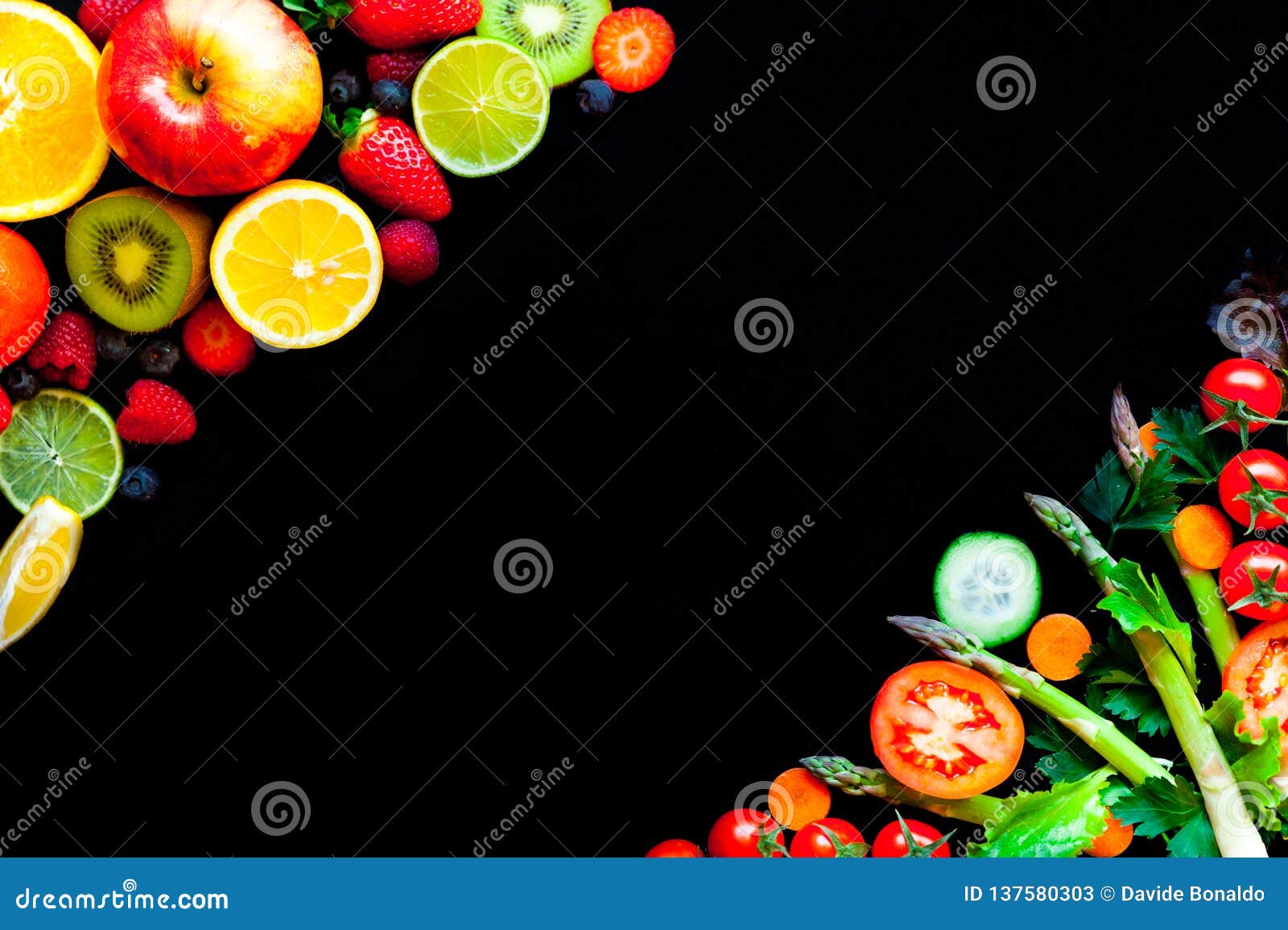 Background with Spring and Summer Fruits and Vegetables on Black Table ...
