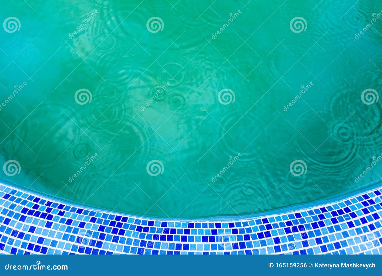 Background of Swimming Water in a Pool with Rain Drops on the Surface ...