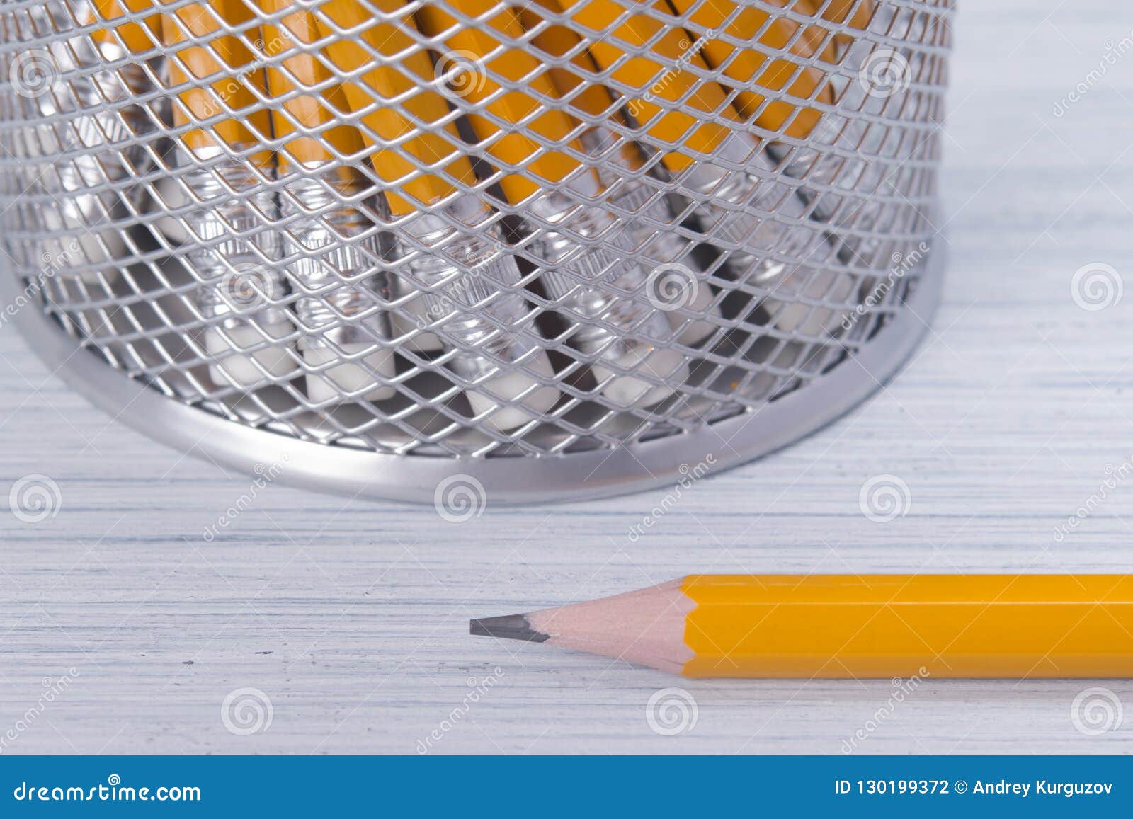 Background on the Table, in the Cup Holder and Erasers Close-up of a ...
