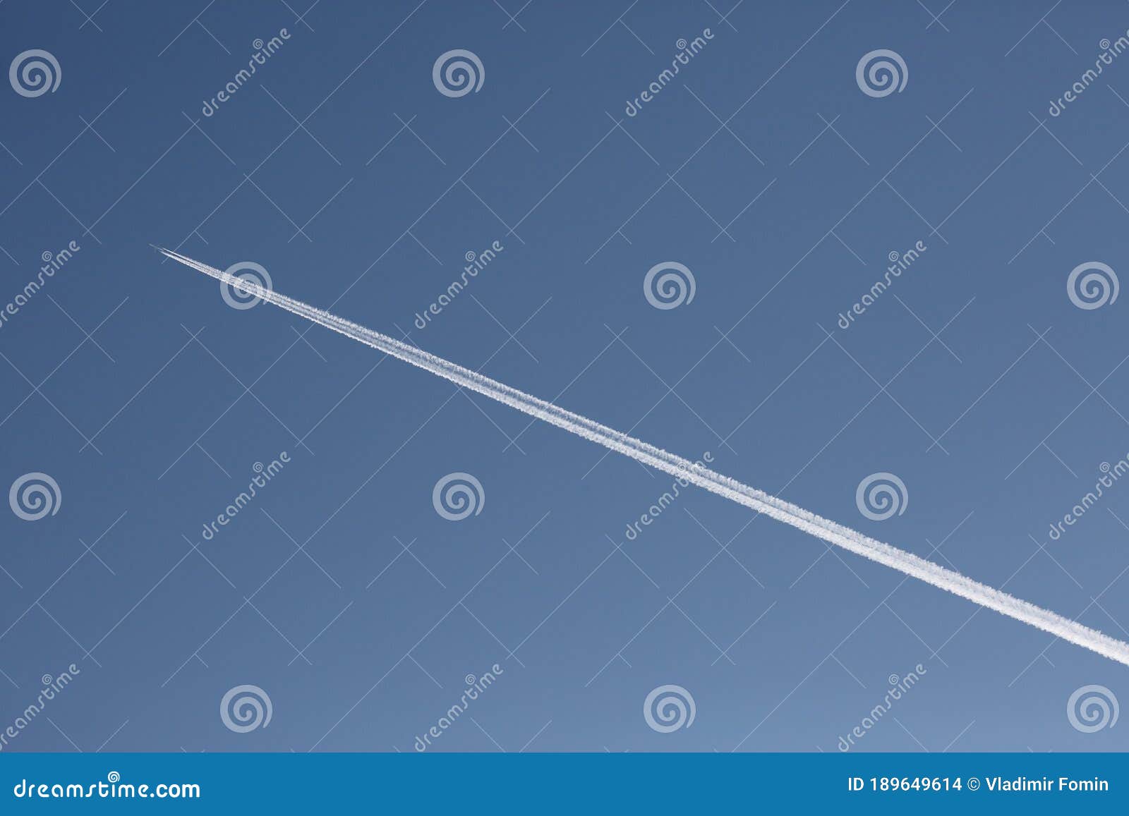 Trace of an airliner. stock photo. Image of travel, clouds - 189649614