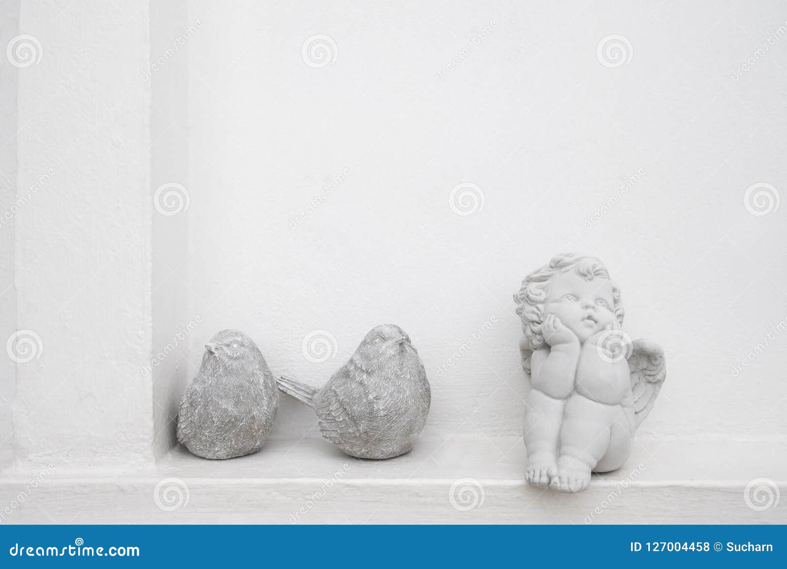 Background and Texture of Cement Angel Statue on the White Wall. Stock ...