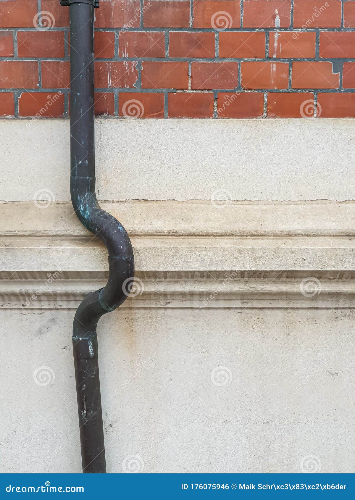 Background Texture Stone Wall of Bricks and a Gutter Stock Photo ...