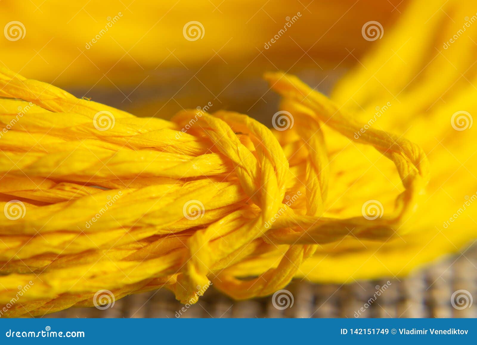 Background Texture of Yellow Rope with Knot. Concept and Design Stock ...