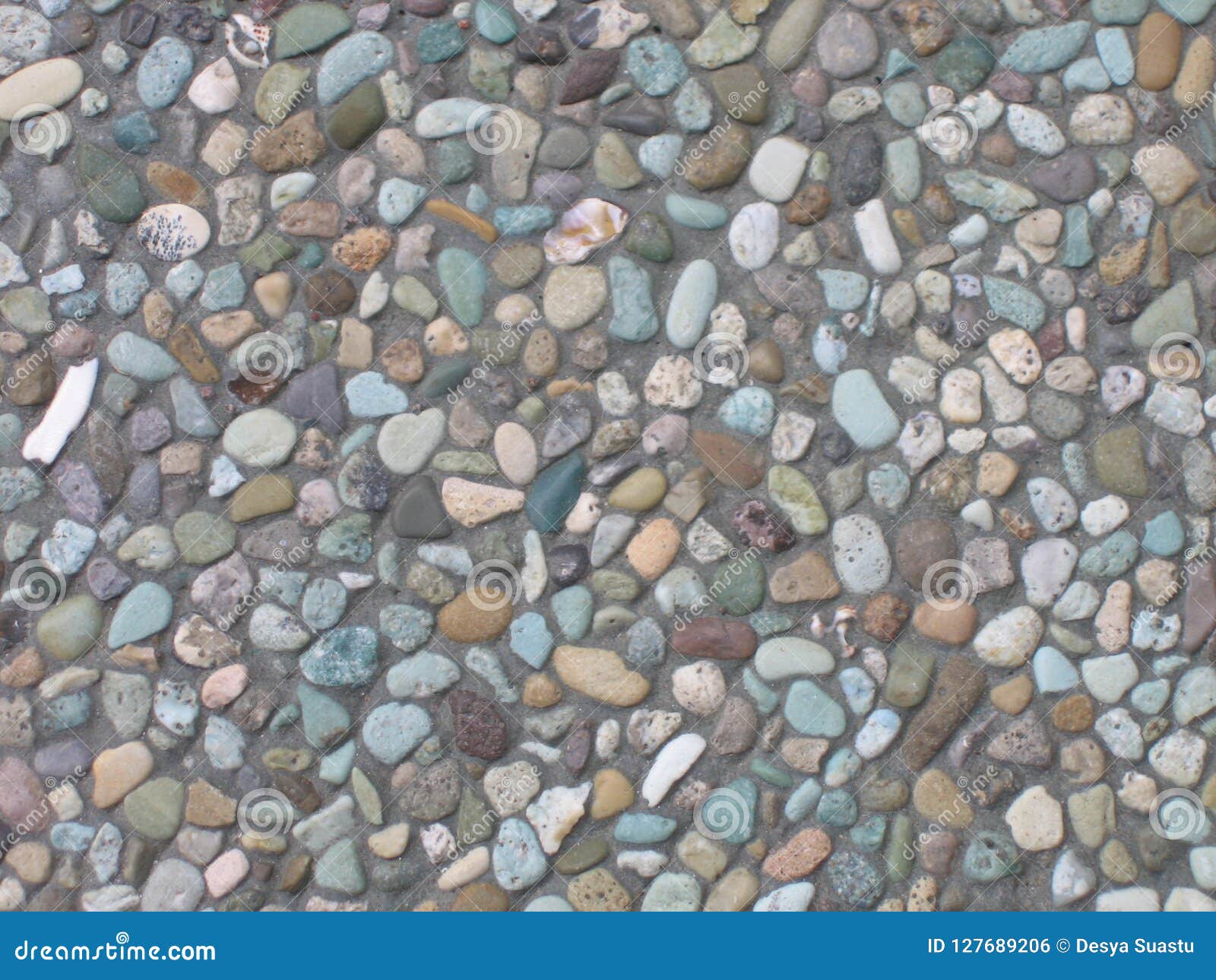 Background Type View of Small Rocks on a Pavement Road Stock Photo ...
