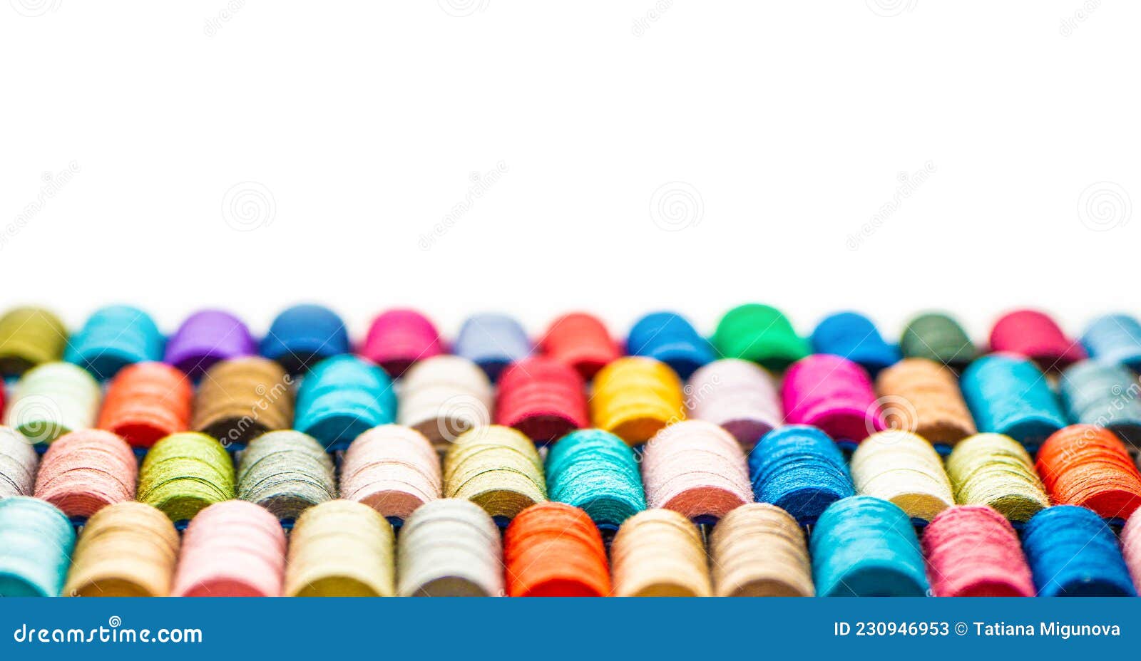 Multi-colored Sewing Threads Laid Out in a Row. Bright Background ...
