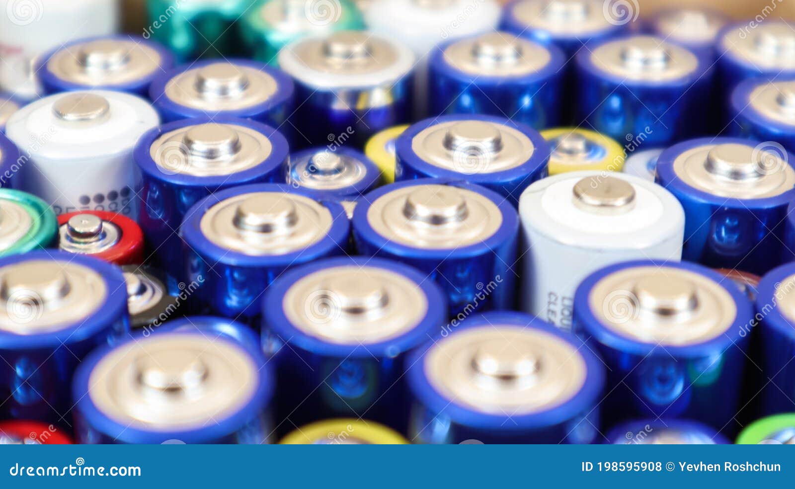 Background View Of AAA AA Batteries And Rechargeable Batteries. Choice ...