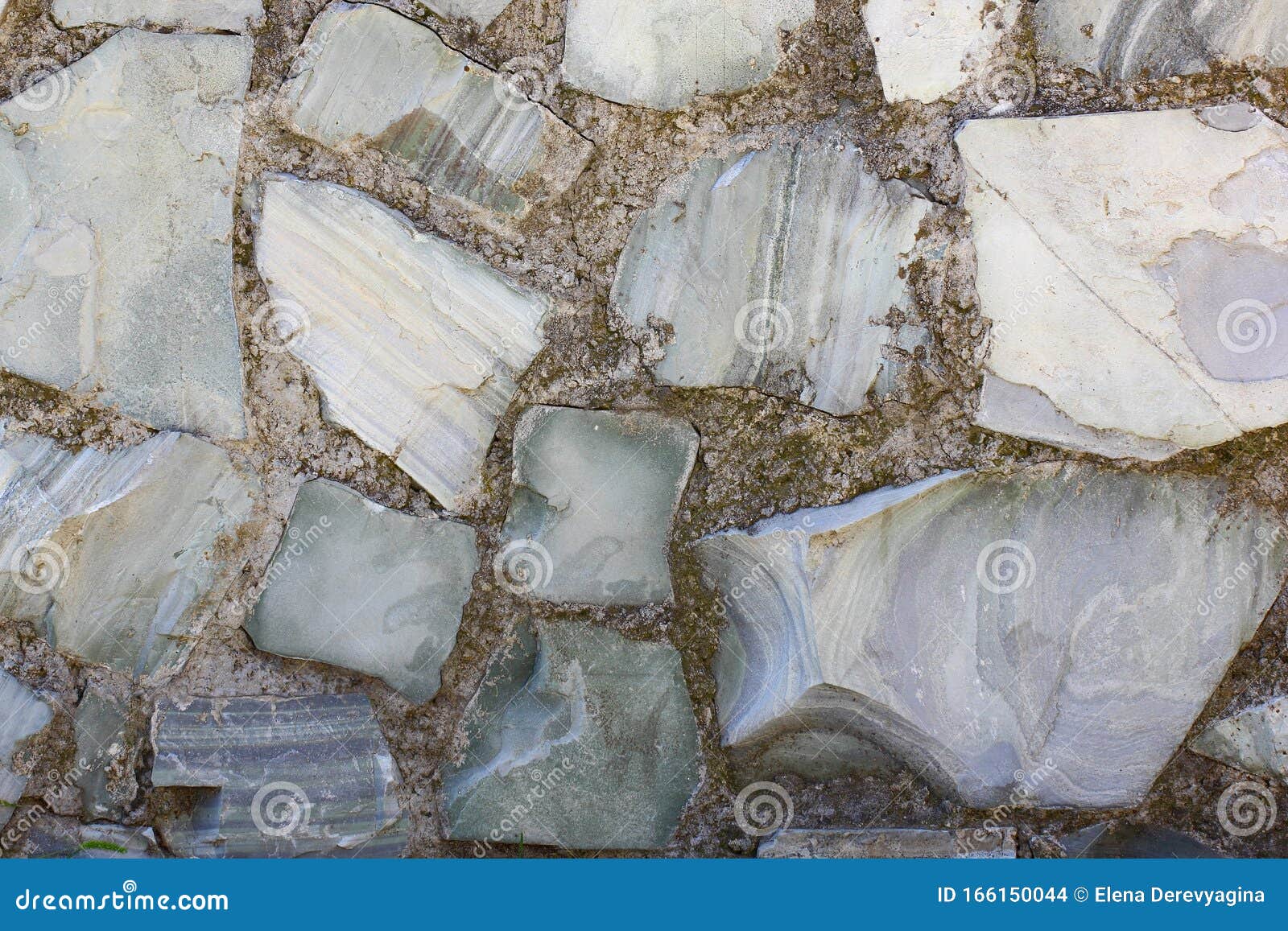 The Background Wall is Cobbled with Stones Mineral with a Layered ...